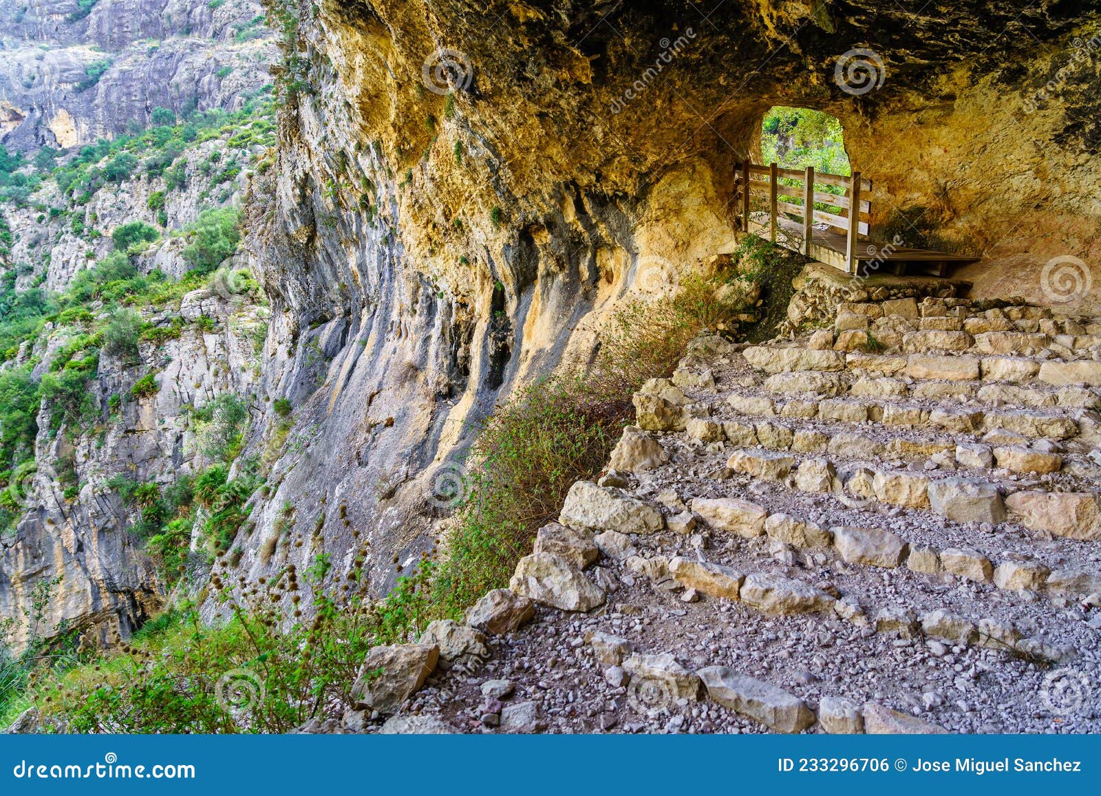 Cave in the Mountain with a Path with Steps for Hikers. Stock Photo ...