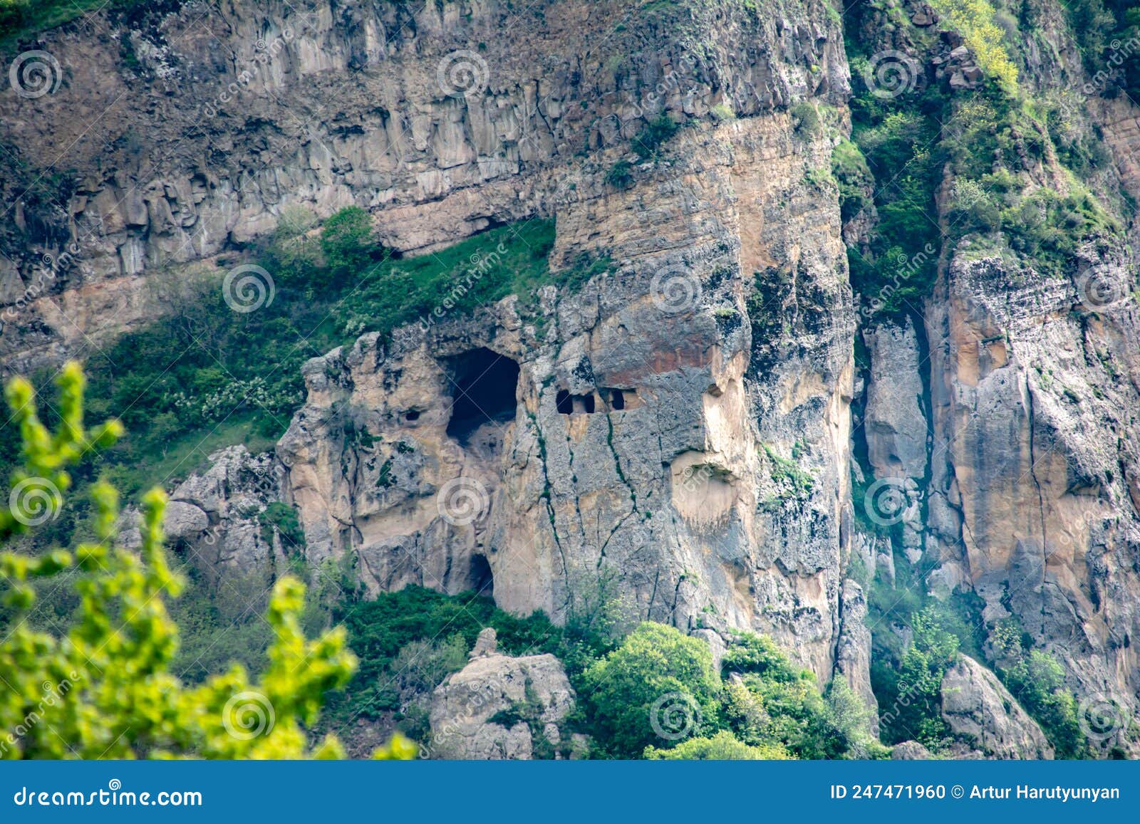 Cave in the Mountains. Steep Cliffs and a Cave with Trenches and Rooms ...