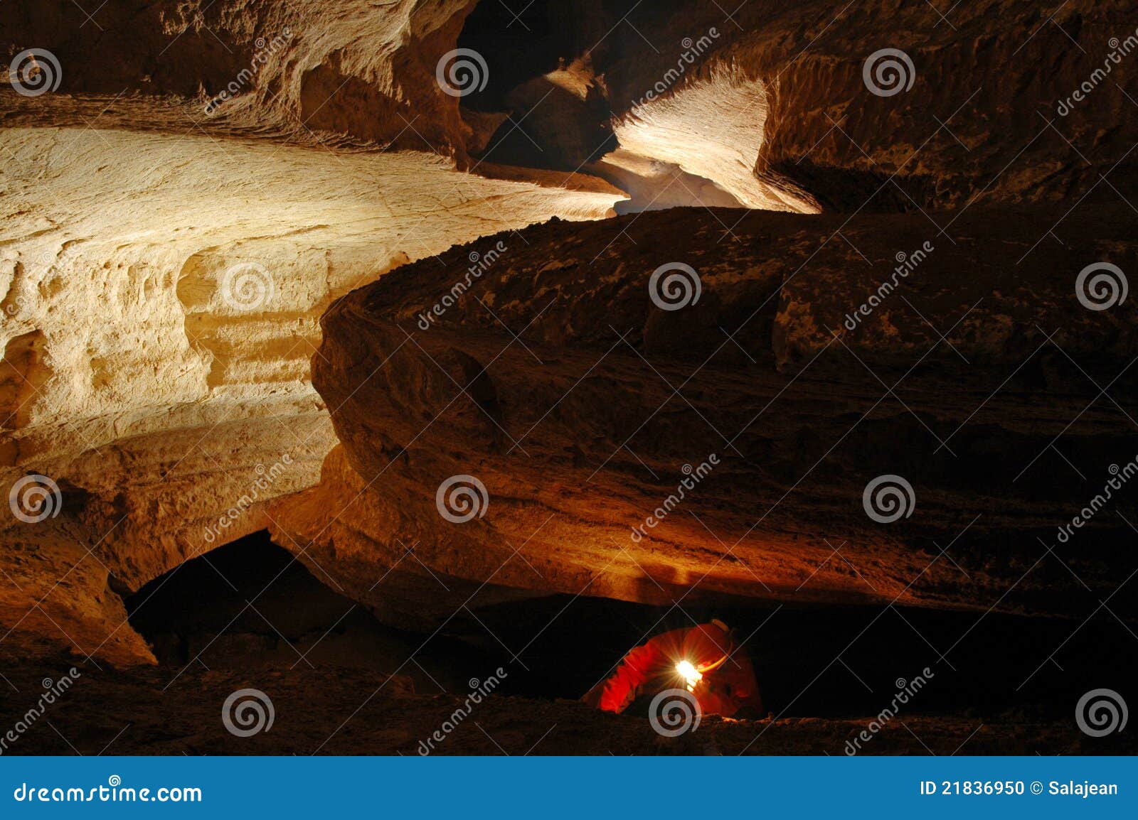 Cave passage with a caver stock photo. Image of beauty - 21836950