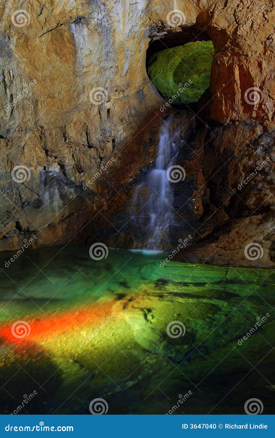 Cave with rainbow pond stock photo. Image of colorful - 3647040