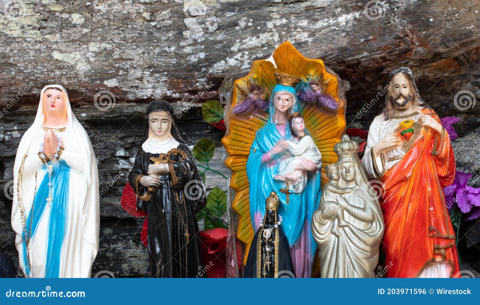 Cave with Religious Statues Stock Photo - Image of travel, sculpture ...