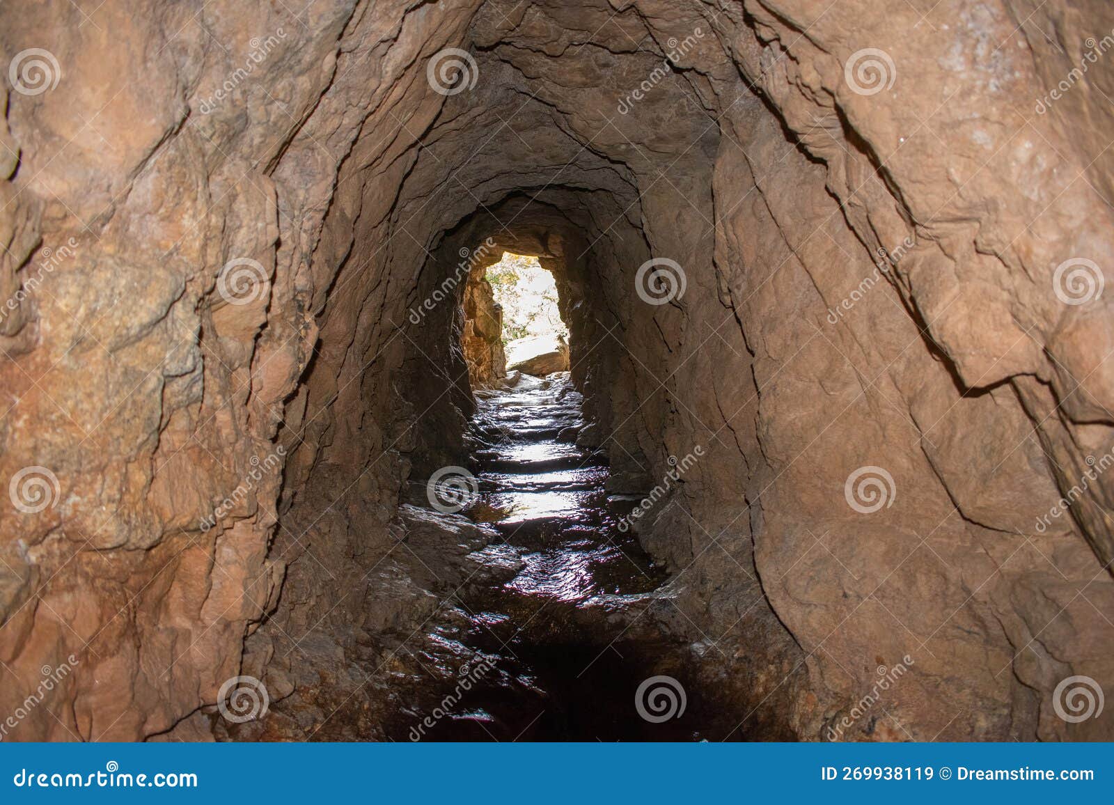 Cave in Rocky Mountain with River on the Floor Stock Image - Image of ...