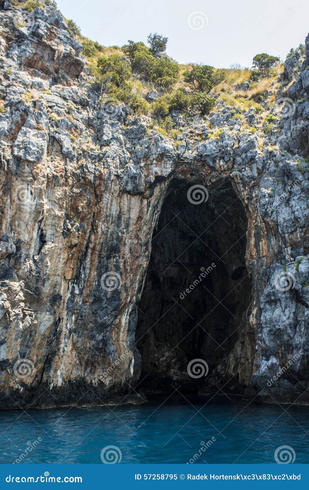 Cave stock image. Image of cove, rocks, outcrop, promontory - 57258795