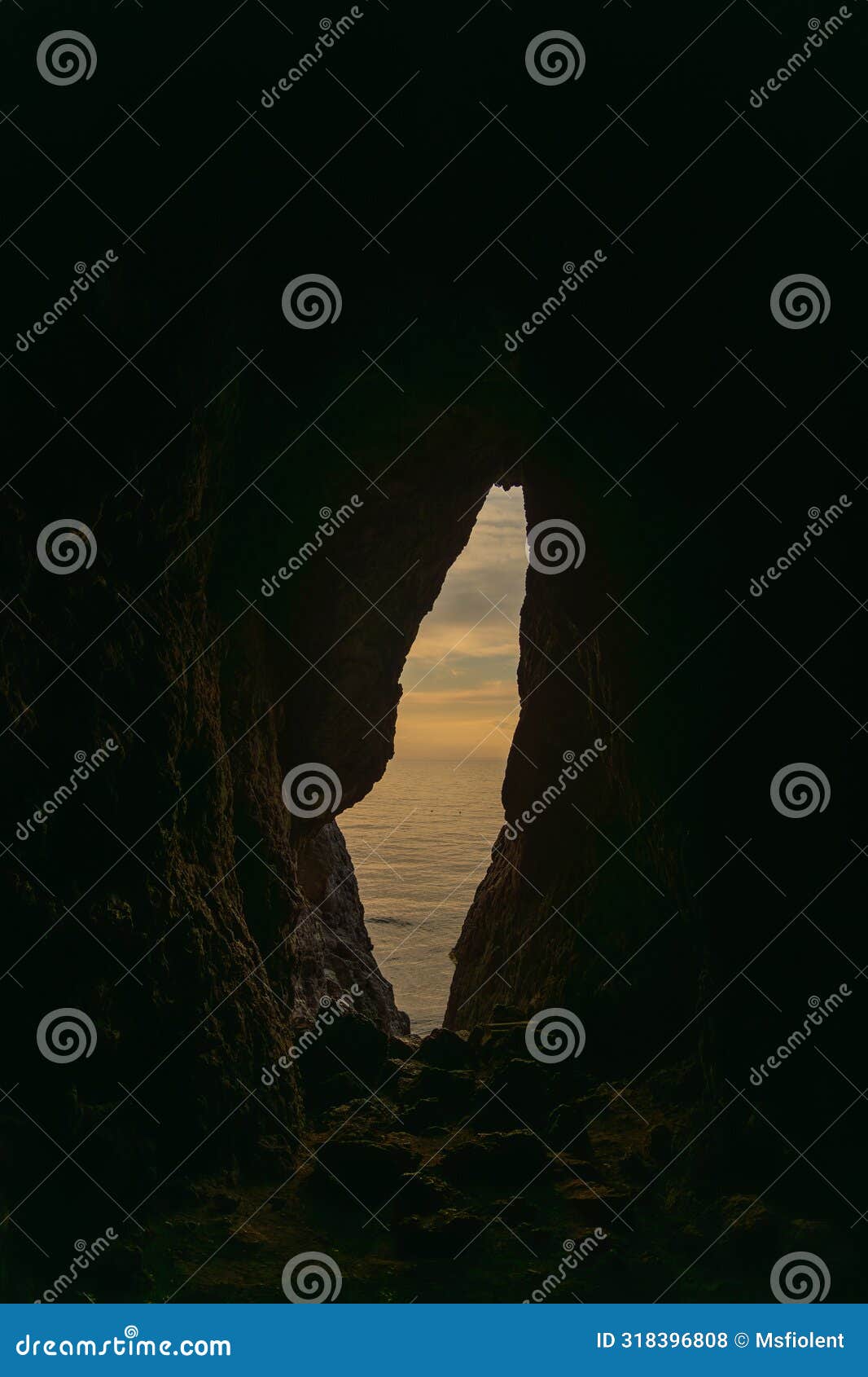 A Cave with a Small Opening in the Wall. the Cave is Dark and the Sky ...