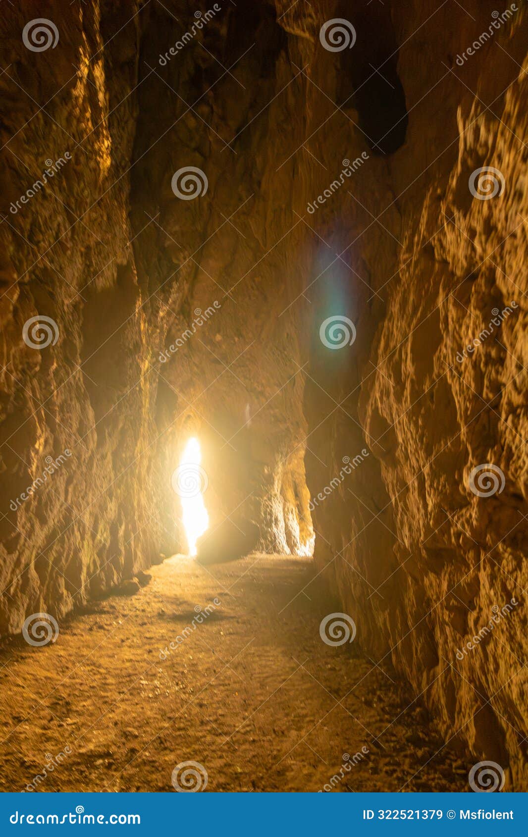 A Cave with a Small Opening in the Wall. the Light Shining through the ...