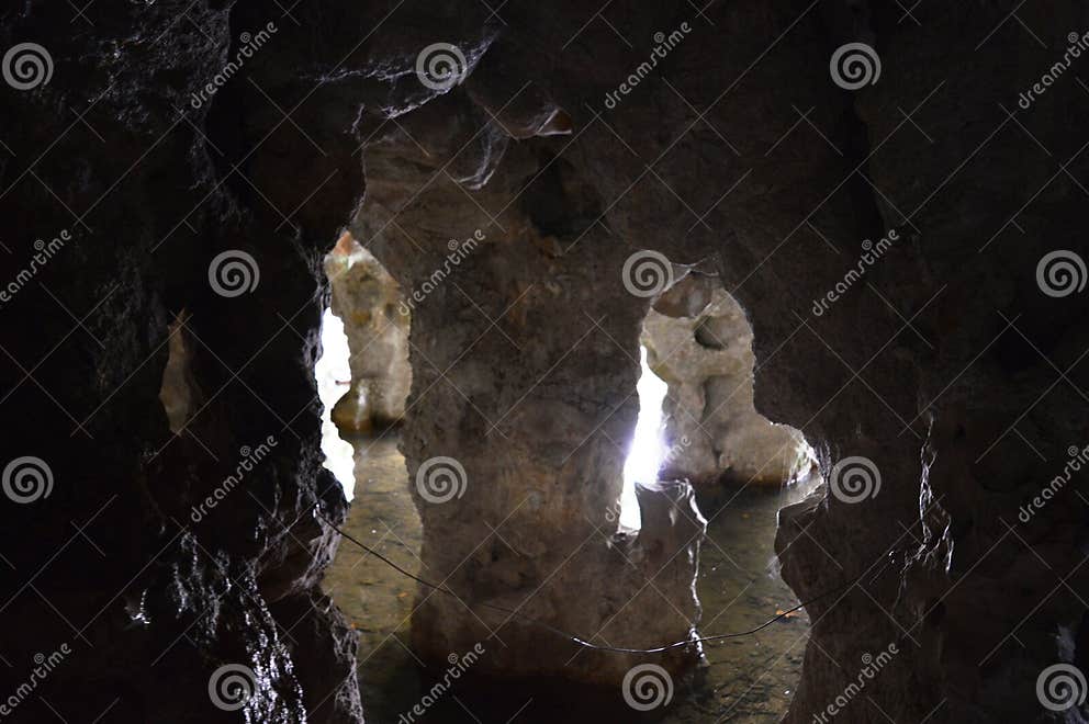 Cave with Windows in the Water Stock Image - Image of cave, light ...