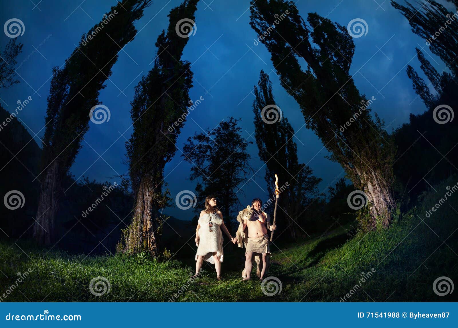 Caveman Couple in Dark Forest Stock Photo - Image of hunter, couple ...