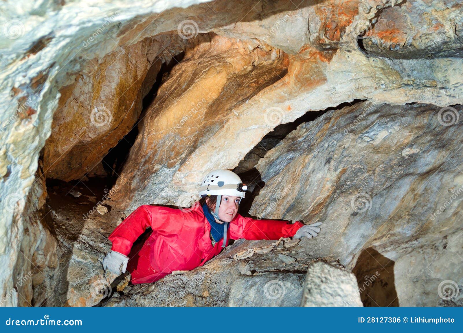 Caver exploring the cave stock photo. Image of female - 28127306