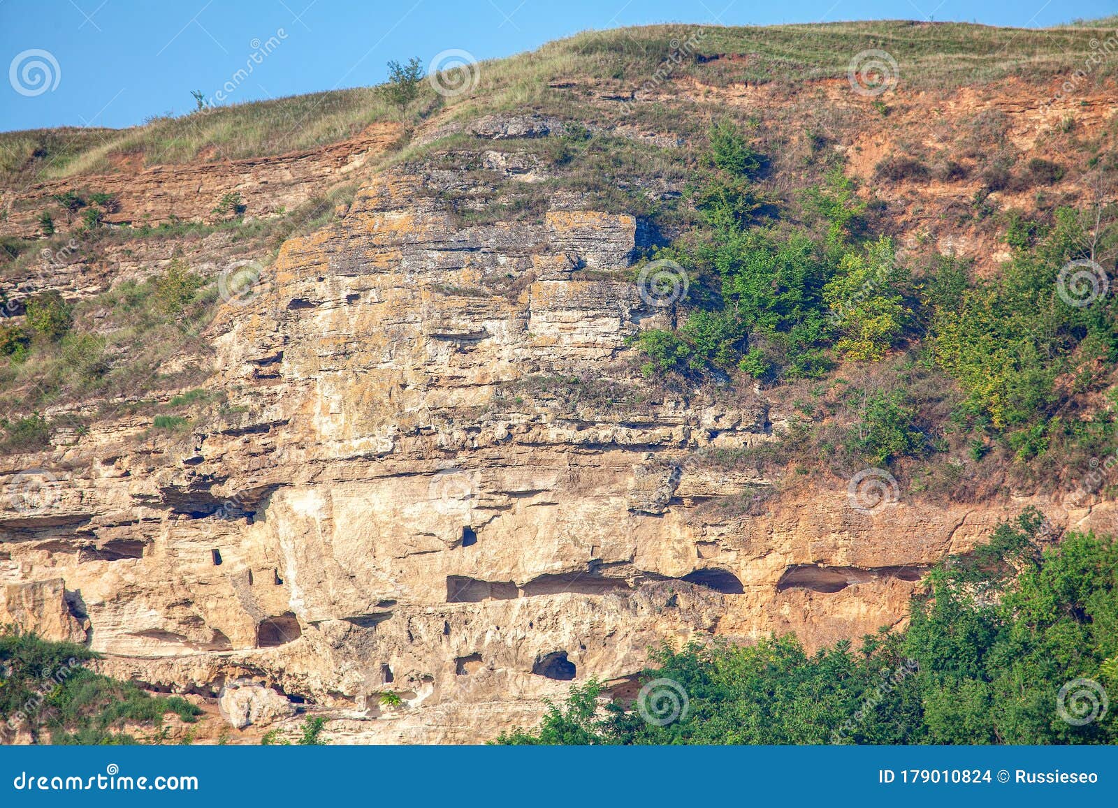 Caves in the cliff stock photo. Image of formation, outdoor - 179010824