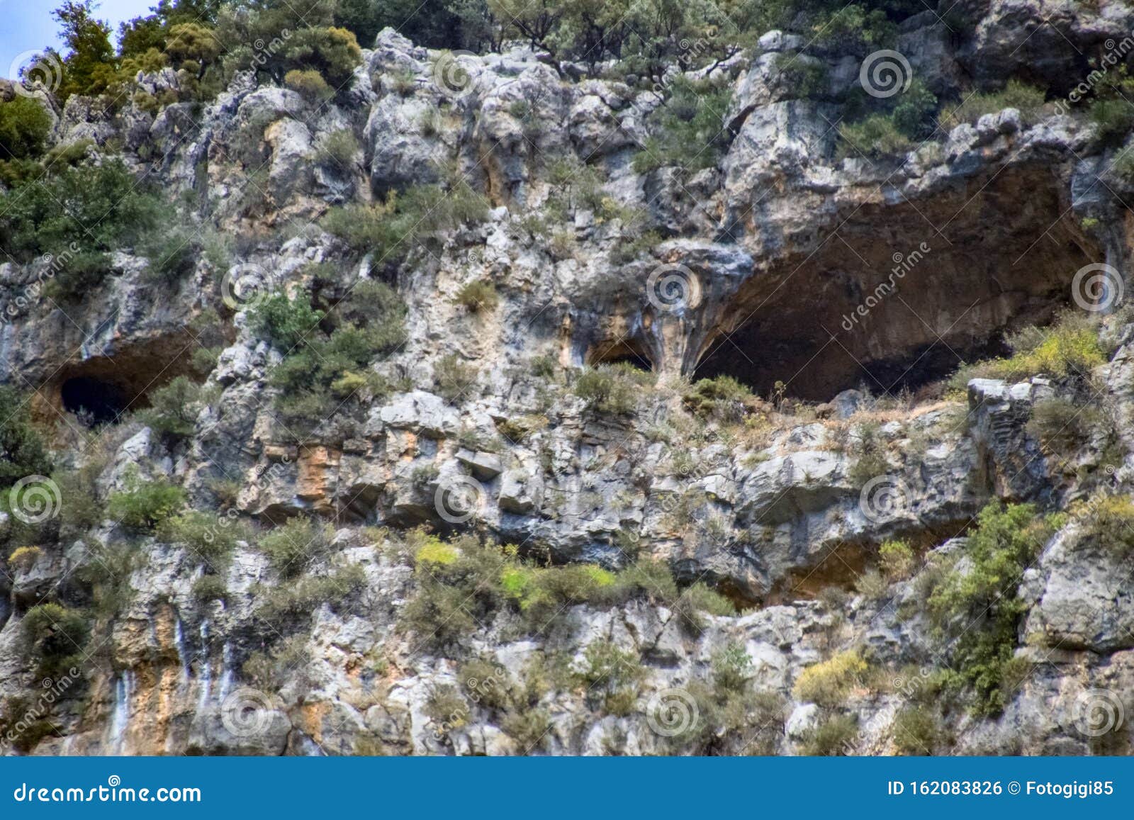 Caves in the Limestone Mountains. Void in Rock Mountain Stock Photo ...