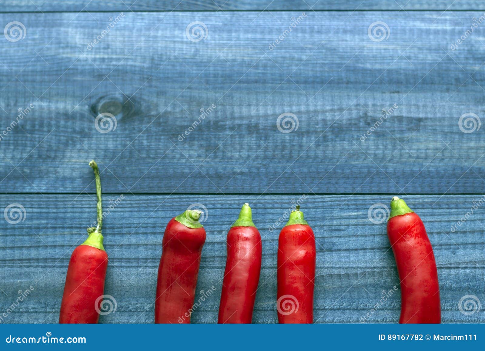 Cayenne Chilli Peppers on Wooden Table Stock Photo - Image of heat ...