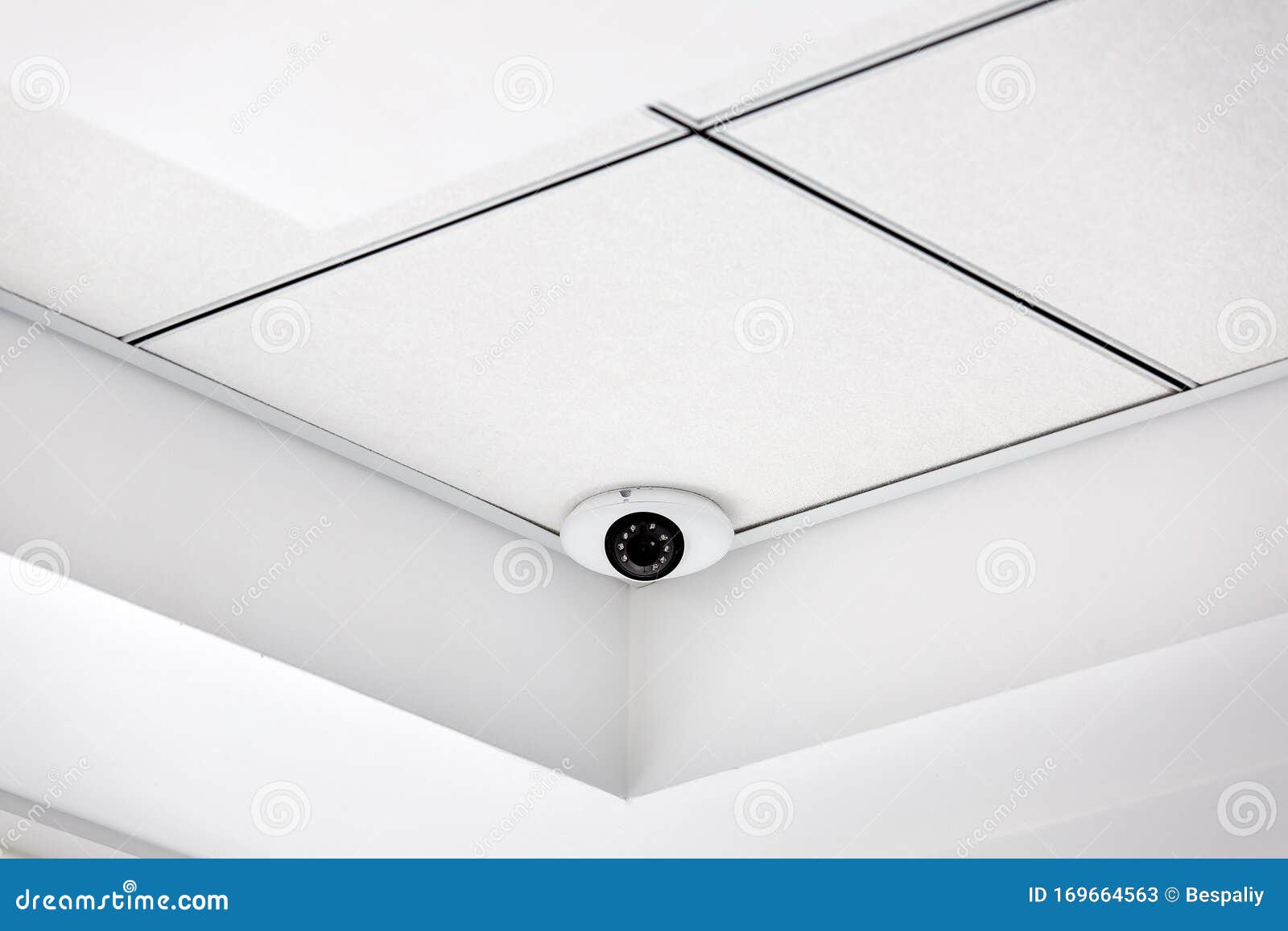 CCTV Camera in the Corner on a White Suspended Ceiling. Stock Image ...