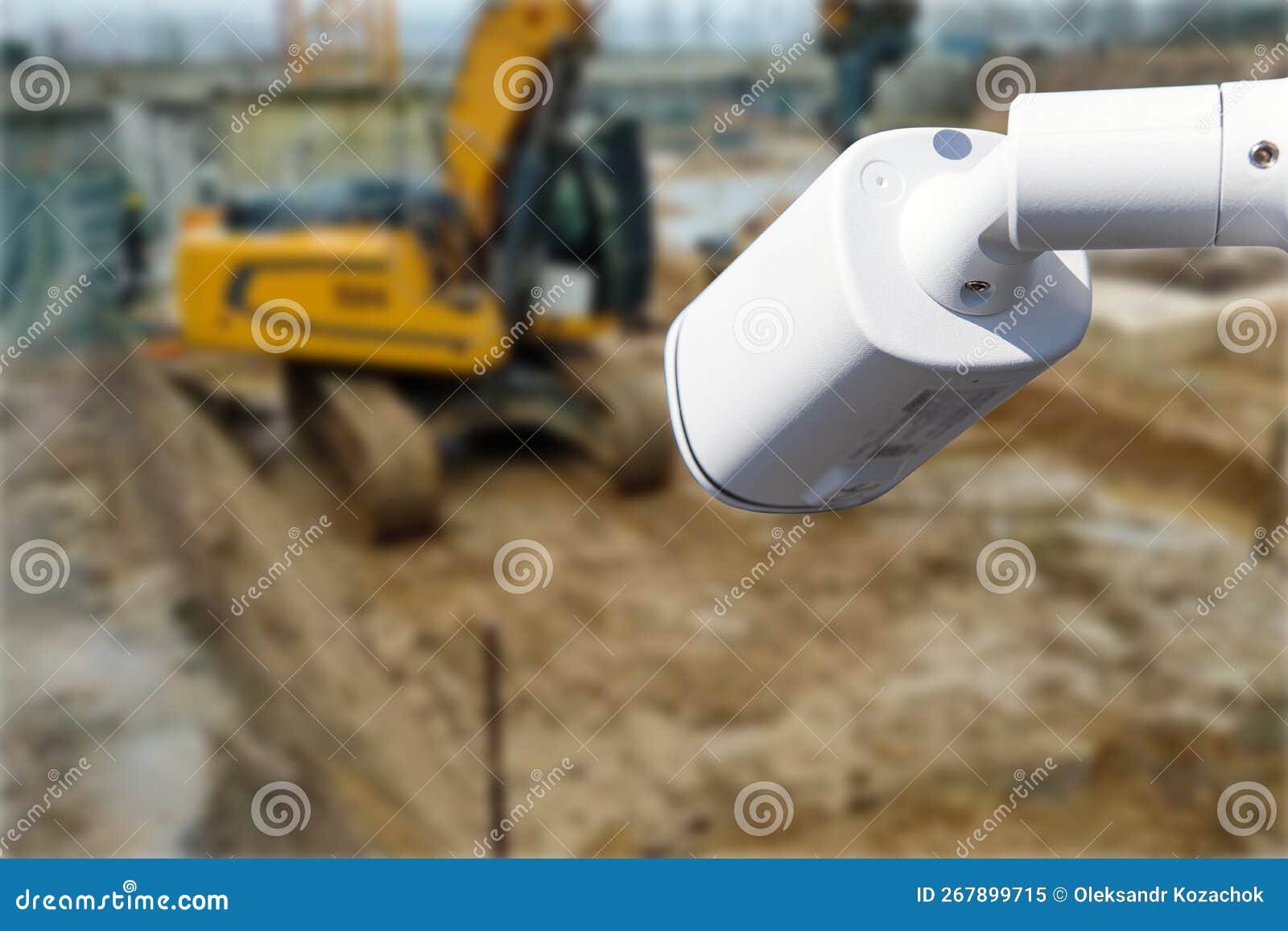 CCTV Camera Watching an Excavator and Workers Working on a Construction ...