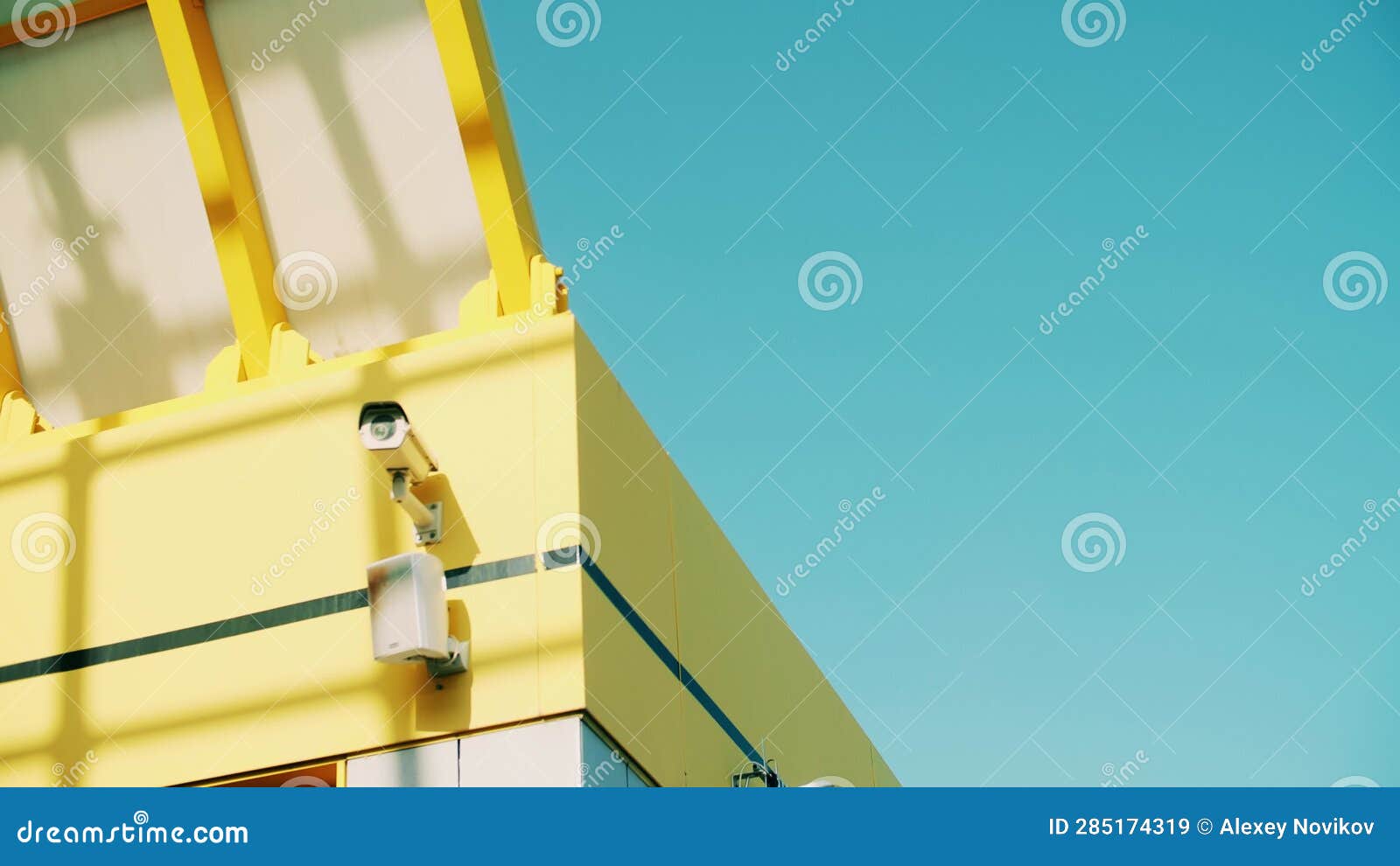A CCTV Camera on Yellow Wall and Blue Sky Stock Video - Video of ...