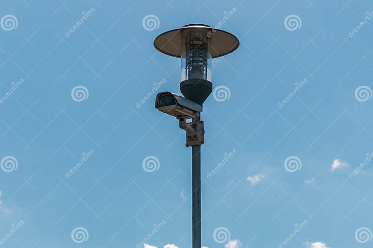 CCTV Cameras Against the Blue Sky. Designed for Visual Control or ...