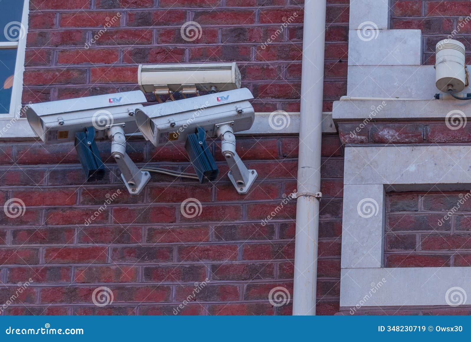 CCTV Cameras on the Wall of the House Stock Image - Image of security ...