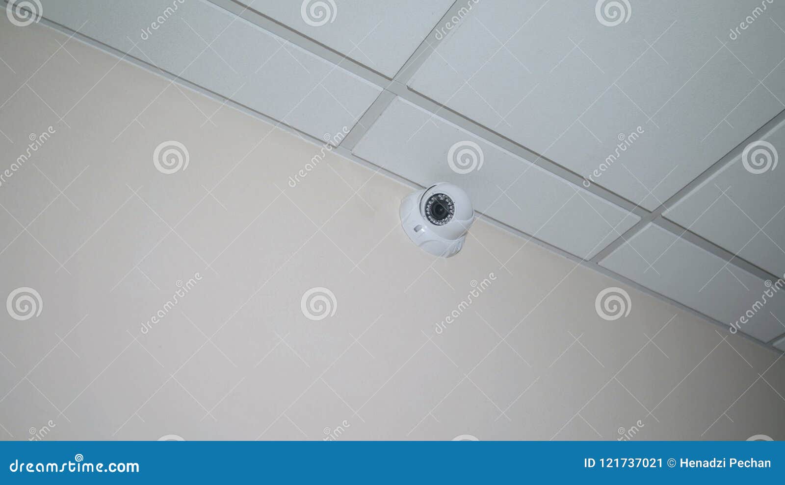 CCTV is Located on the Wall Under the Ceiling, White Round Surve Stock ...
