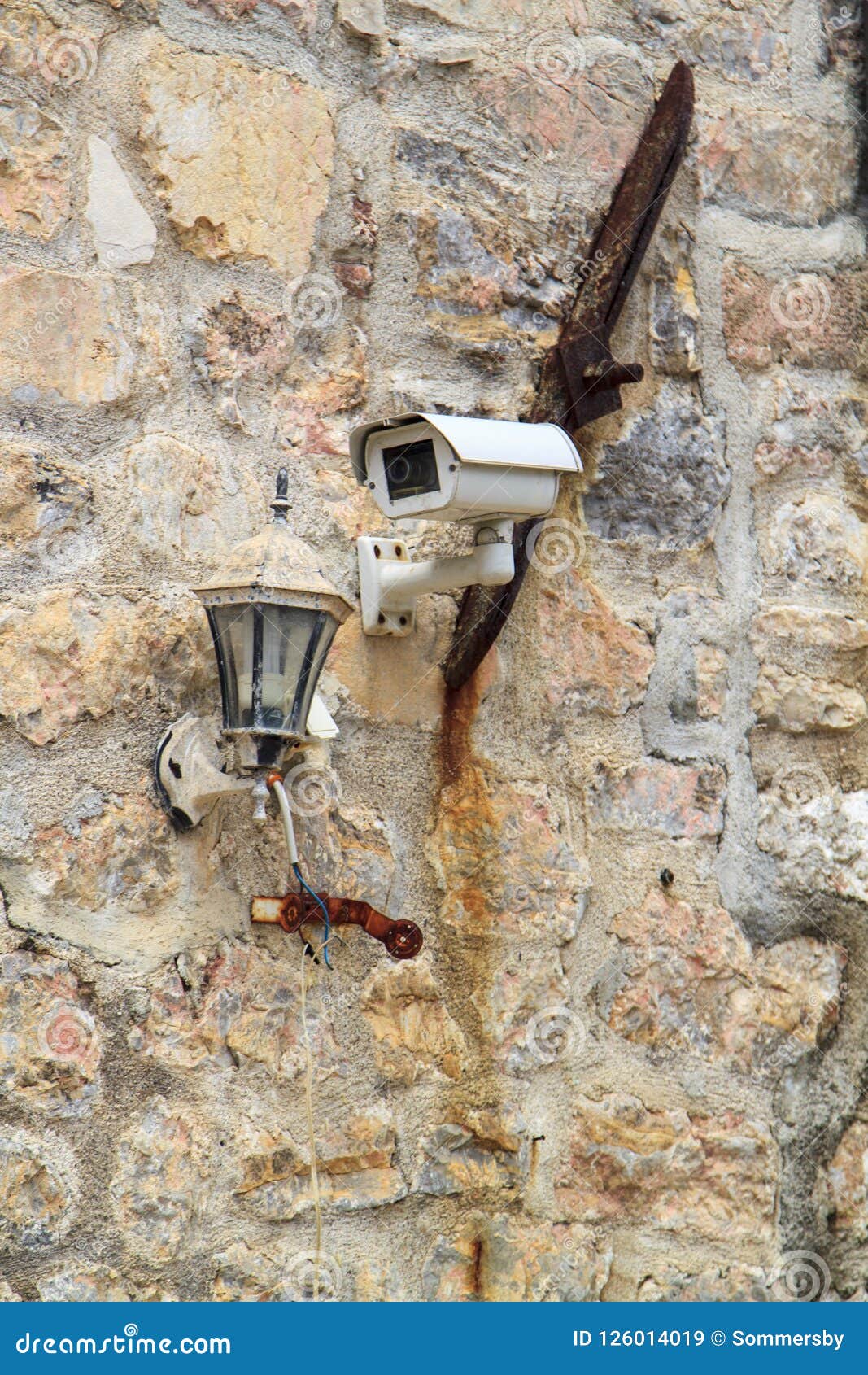 CCTV Security Camera on Ancient Stone Wall Stock Image - Image of blue ...