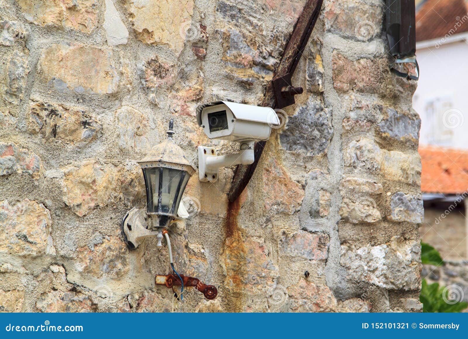 CCTV Security Camera on the Ancient Stone Wall Stock Image - Image of ...
