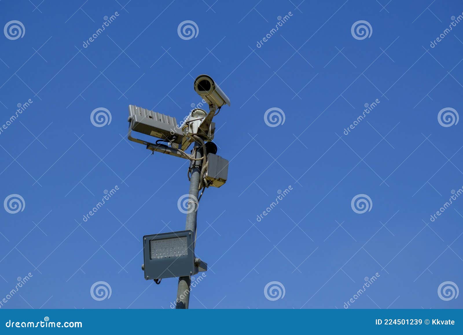 Cctv Security Camera Close-up with a Lamp on Sun Battery Across Blue ...