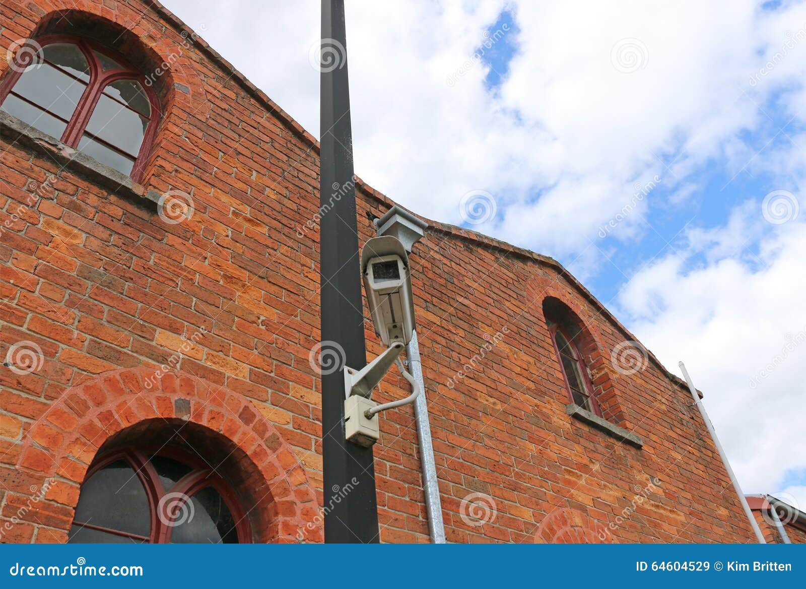 CCTV Security Camera Installed on a Red Brick Building Stock Image ...