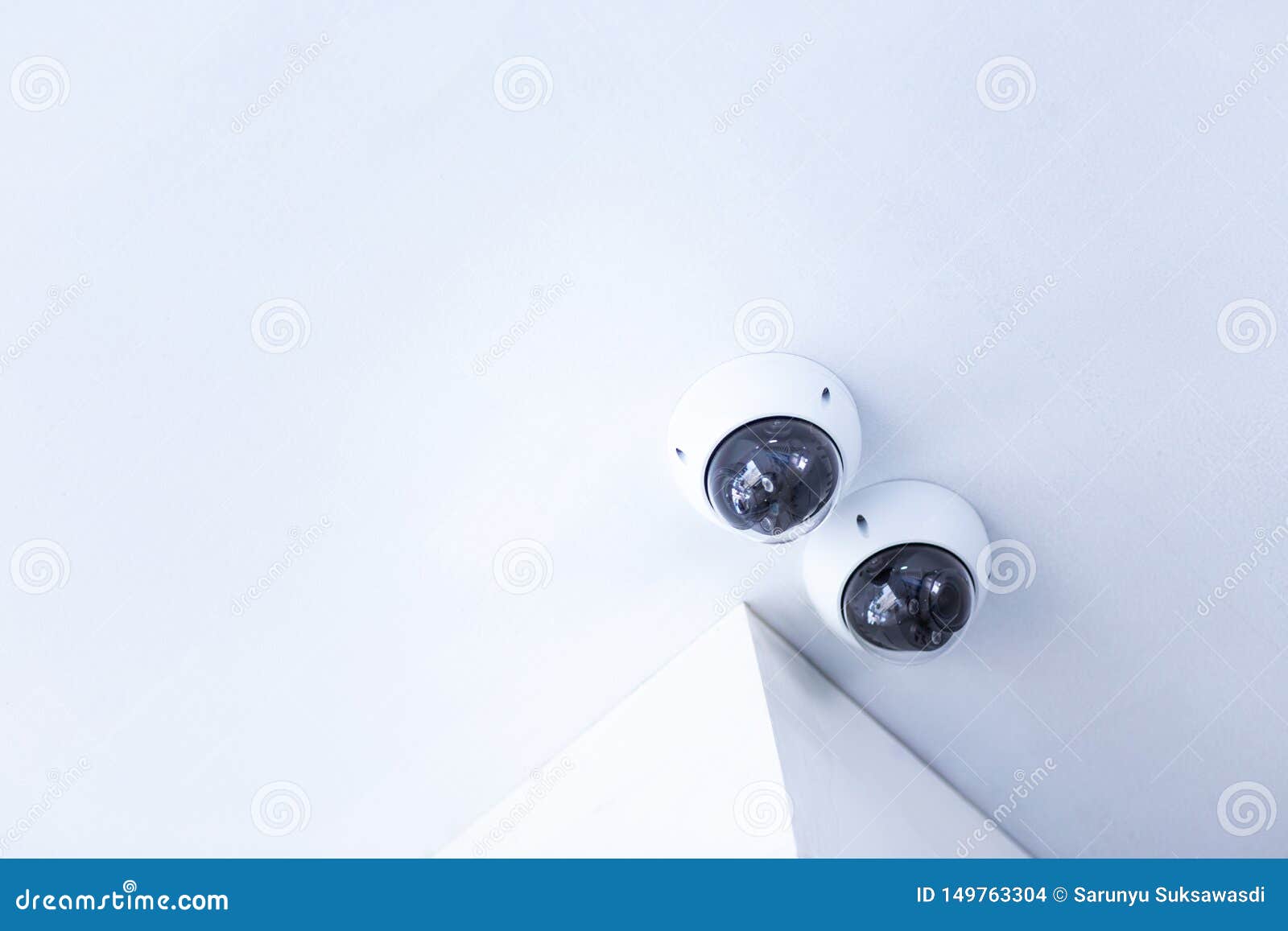 CCTV Security Camera Installed on the White Ceiling Stock Photo - Image ...