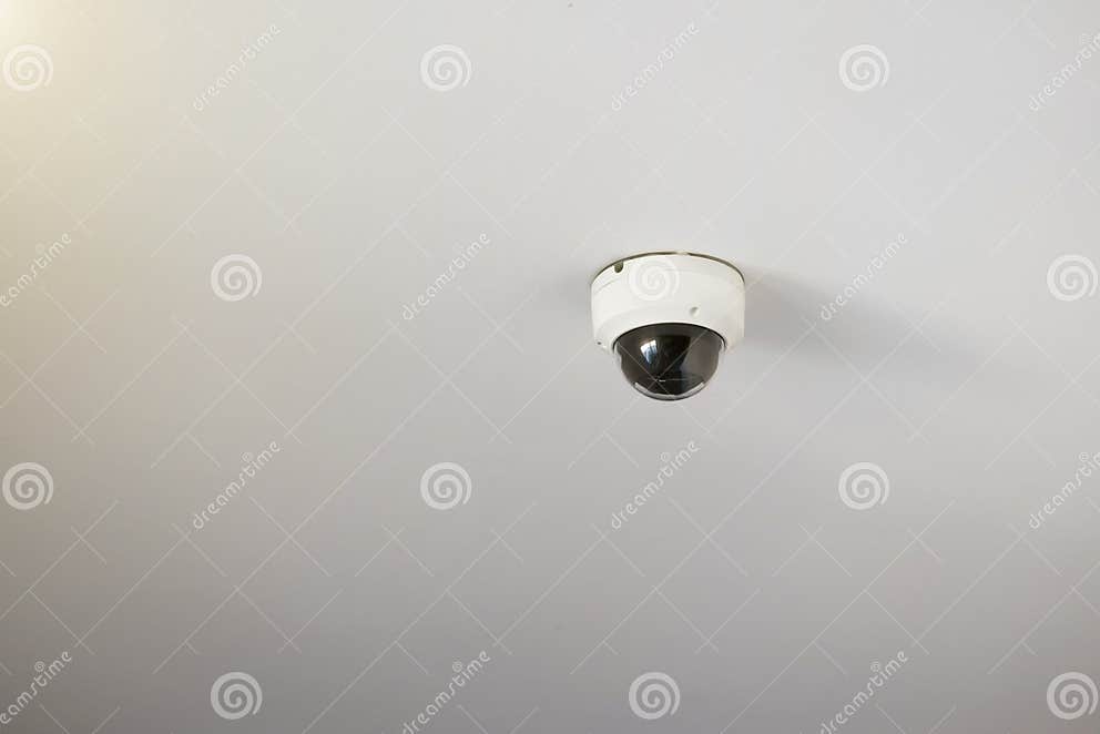 CCTV Security Camera Mounted on a White Ceiling. Stock Photo - Image of ...