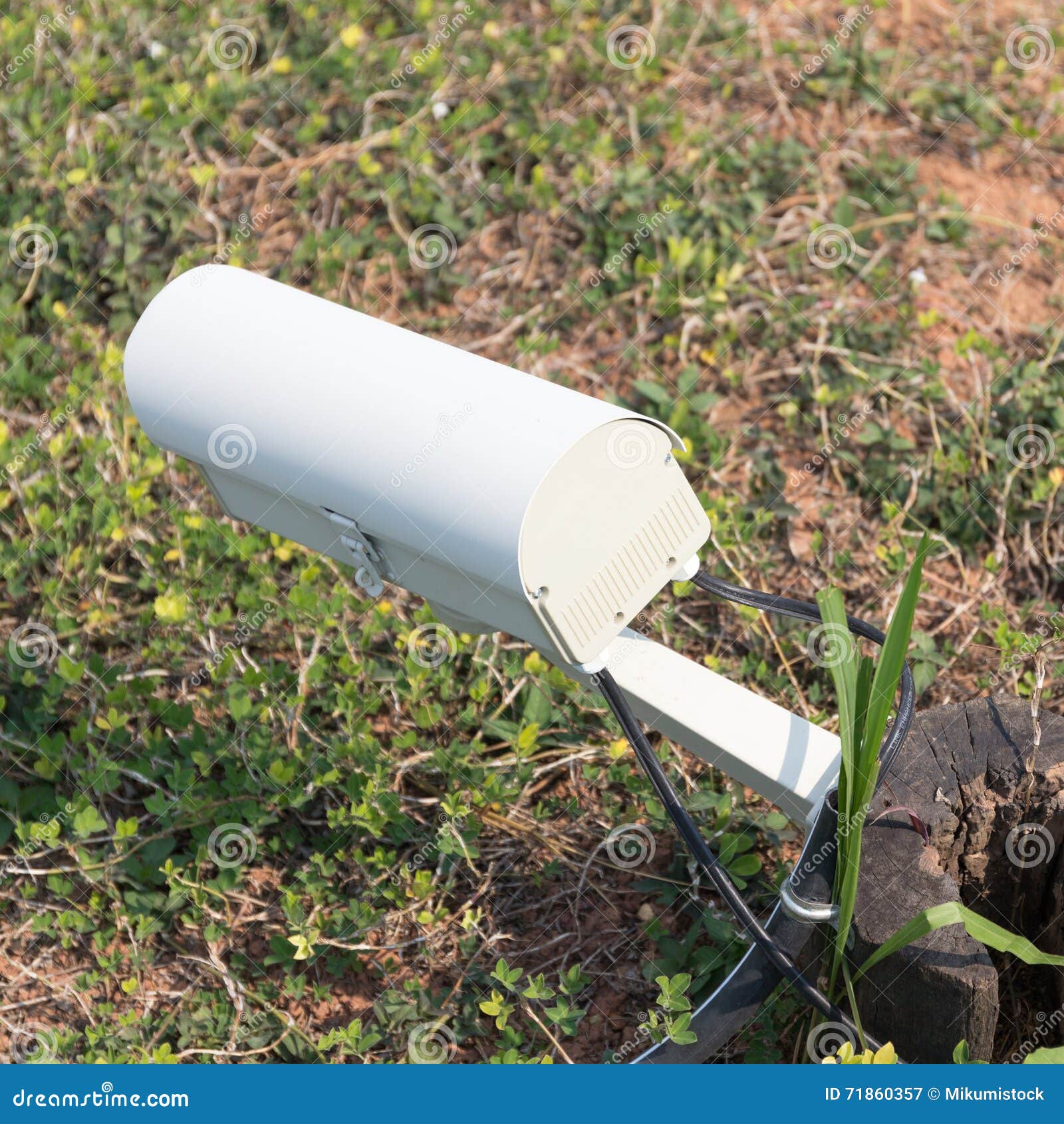 CCTV Security Camera Operating on Ground Lawn Stock Image - Image of ...