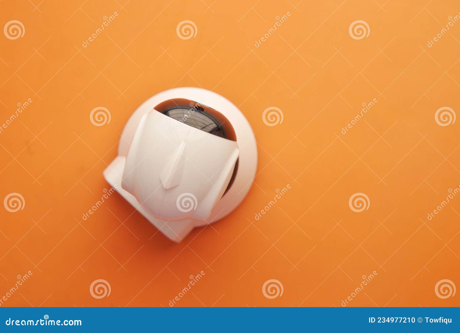 CCTV Security Camera Operating on Light Orange Background Stock Photo ...