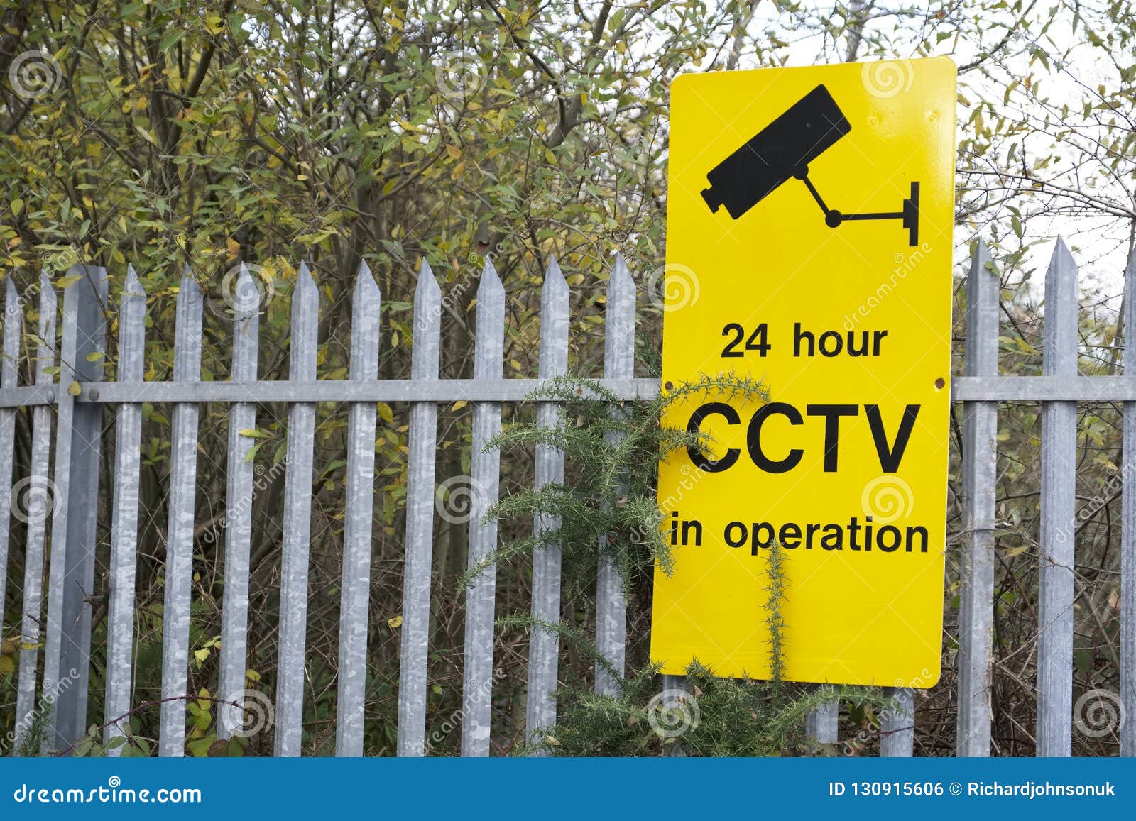 CCTV Yellow Sign on Security Railing Stock Photo - Image of operation ...