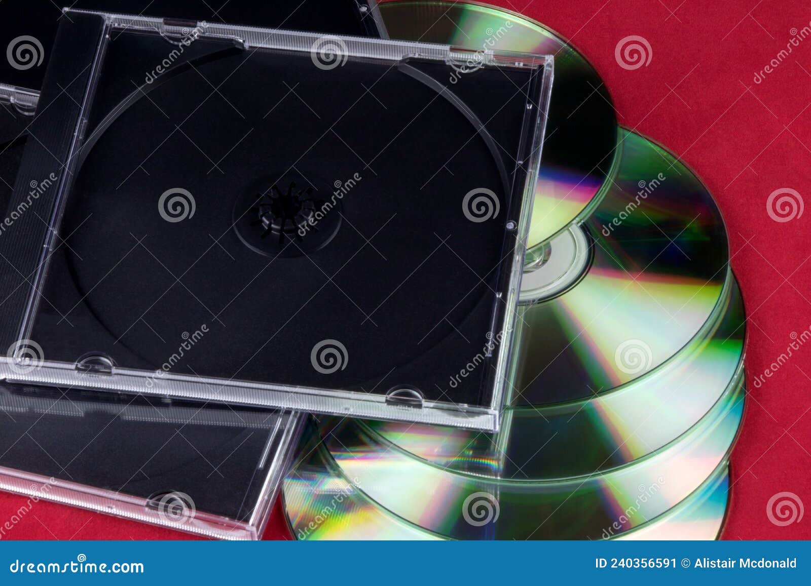 CD Cases and CDs on a Red Background Stock Image - Image of data, case ...