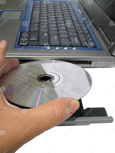 Cd on computer stock image. Image of cdrom, data, computer - 160145