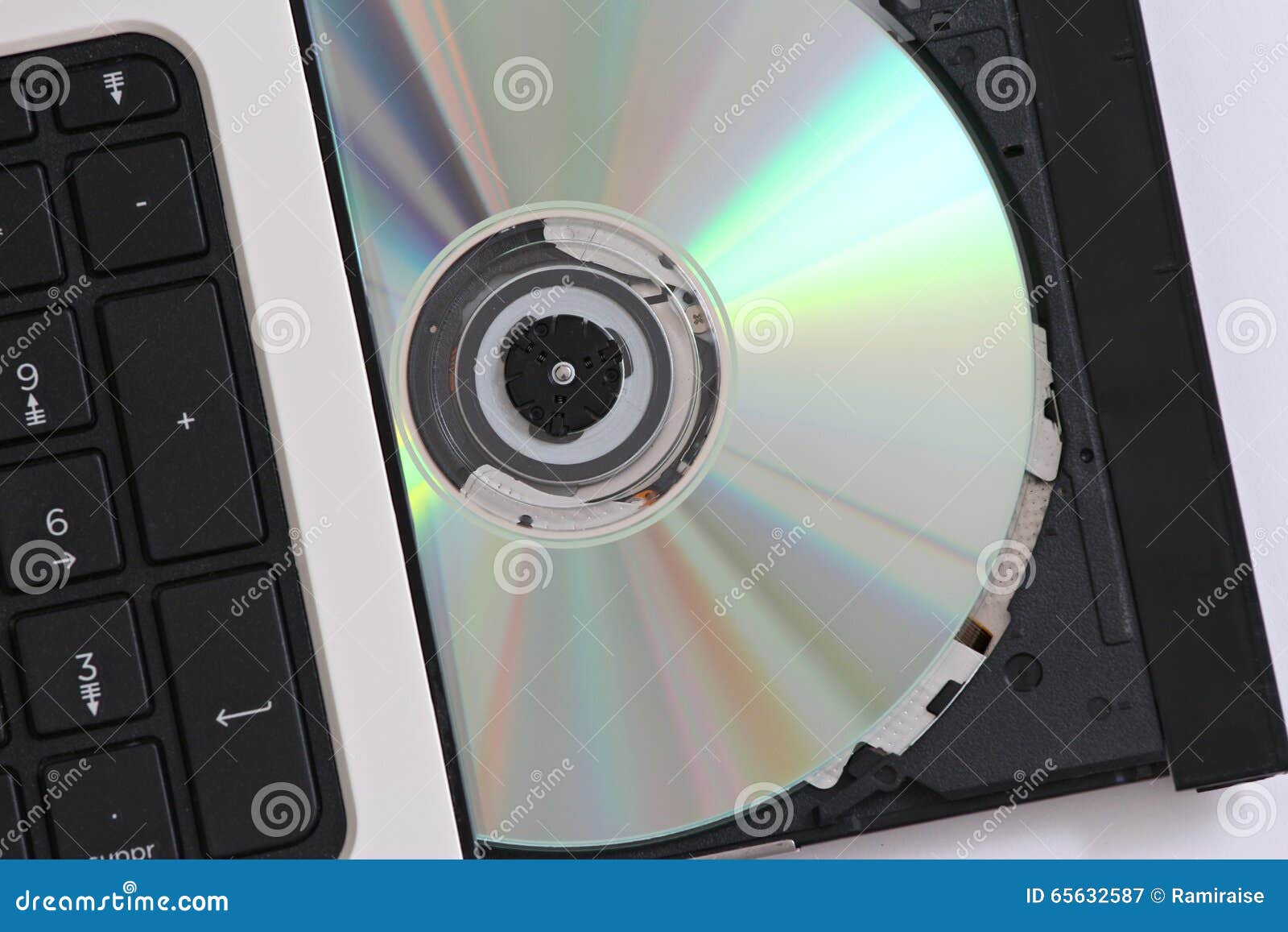CD into a computer stock image. Image of read, entertainment - 65632587
