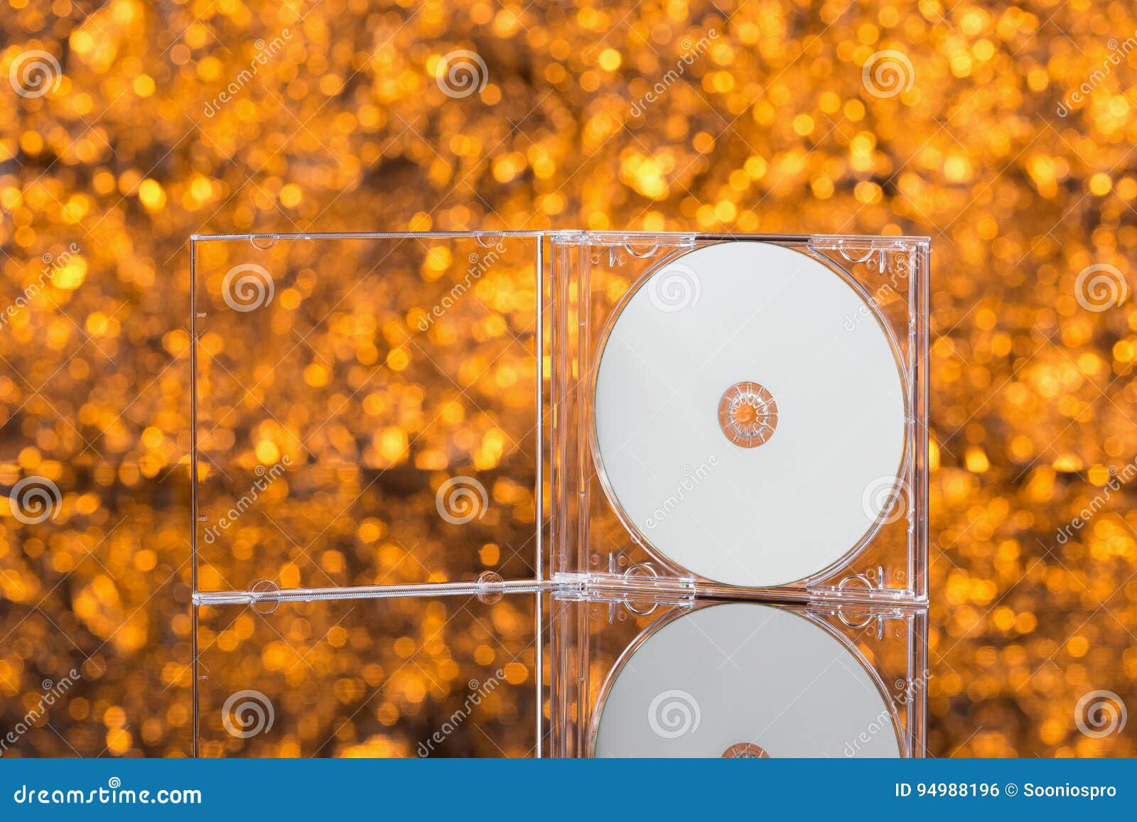 CD / DVD Box on Orange Background Stock Photo - Image of circle ...