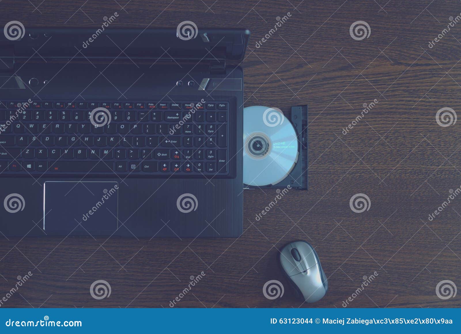 Cd Inserted into a Laptop 3 Editorial Stock Image - Image of multimedia ...
