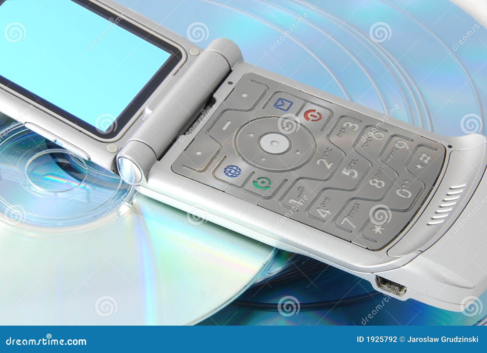 Cd s and a cell phone stock photo. Image of recordable - 1925792