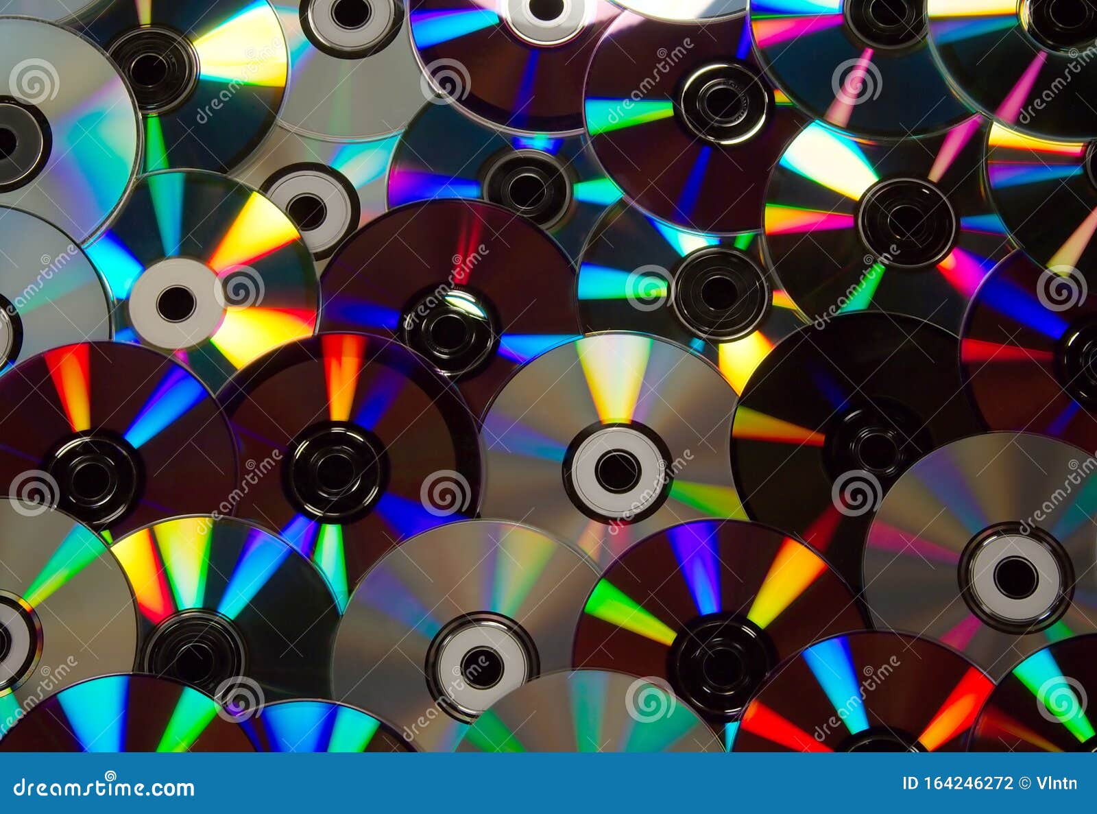 Cds and dvds stock photo. Image of spectrum, dark, shiny - 164246272