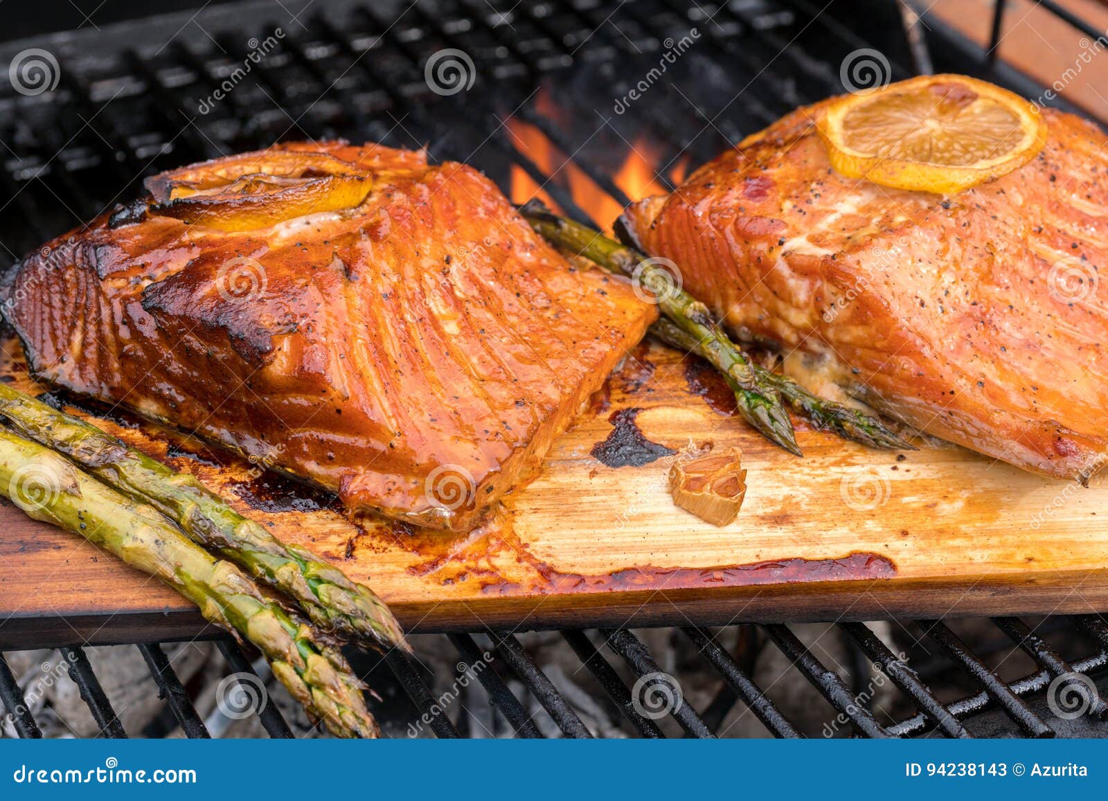 Cedar Plank Salmon with Lemon on a Grill Stock Image - Image of ...