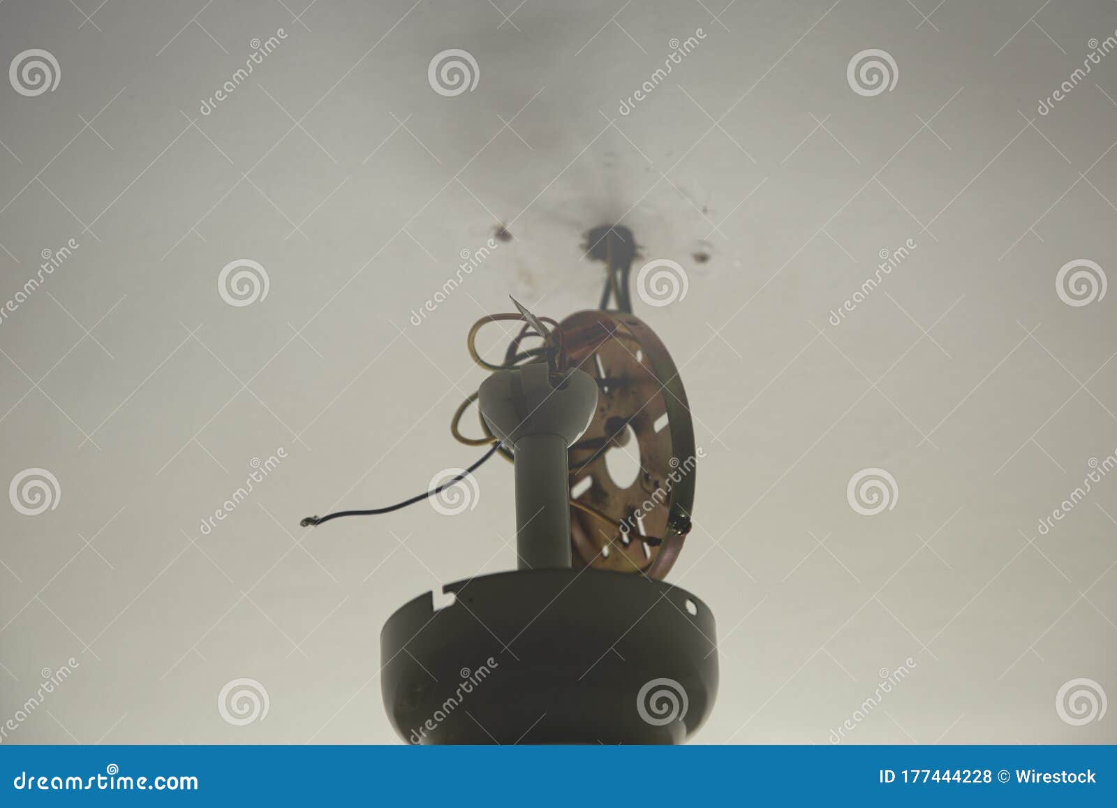 A Ceiling Fan that Has Come Loose and Has Caused an Electrical Fire ...
