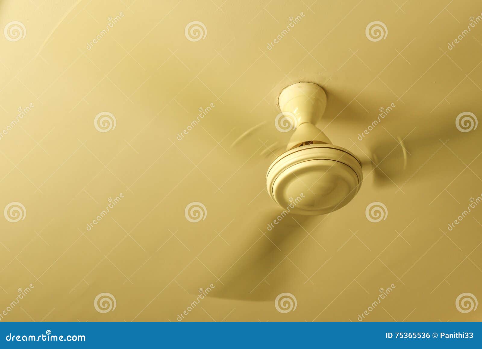 Ceiling Fan in Motion stock photo. Image of white, room - 75365536