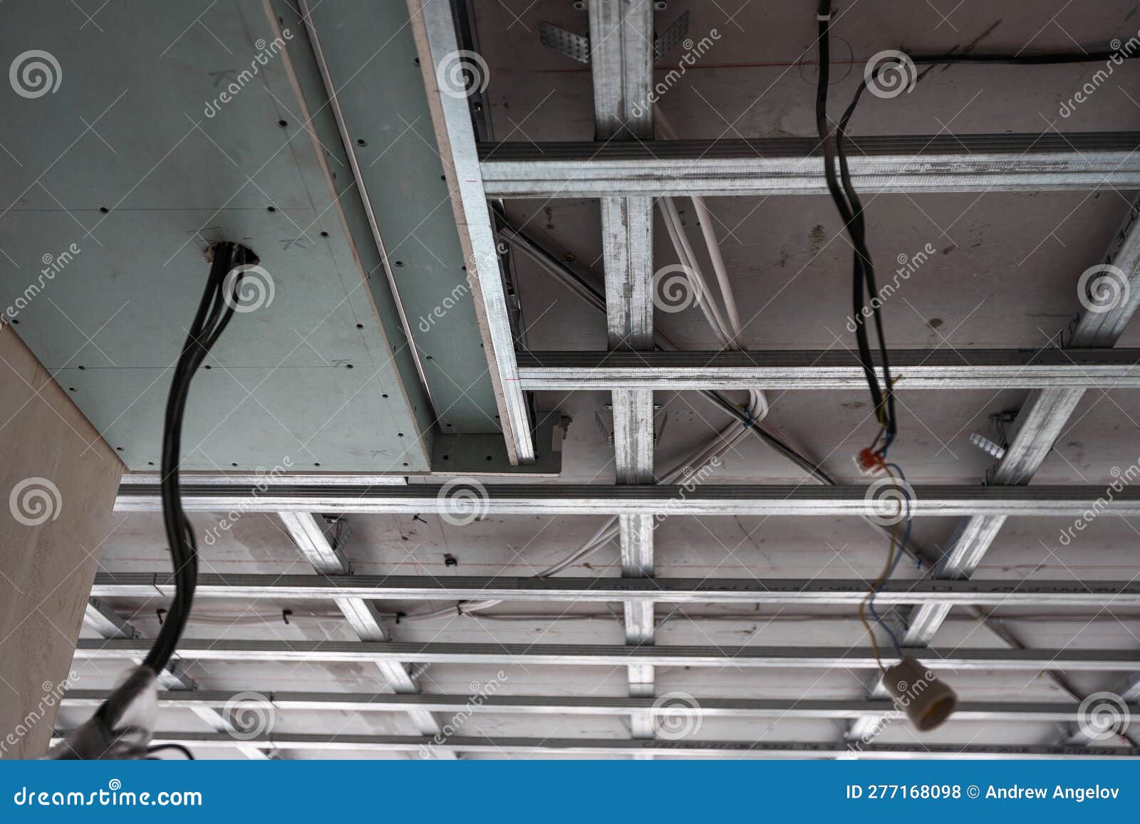 Ceiling Installation with Expert Technicians in the Room that is in the ...