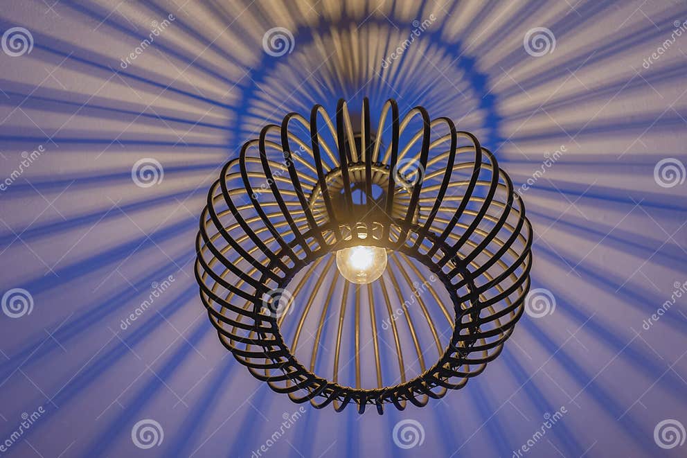 Ceiling Light with Light Rays Creating an Effect on the Wall Stock ...