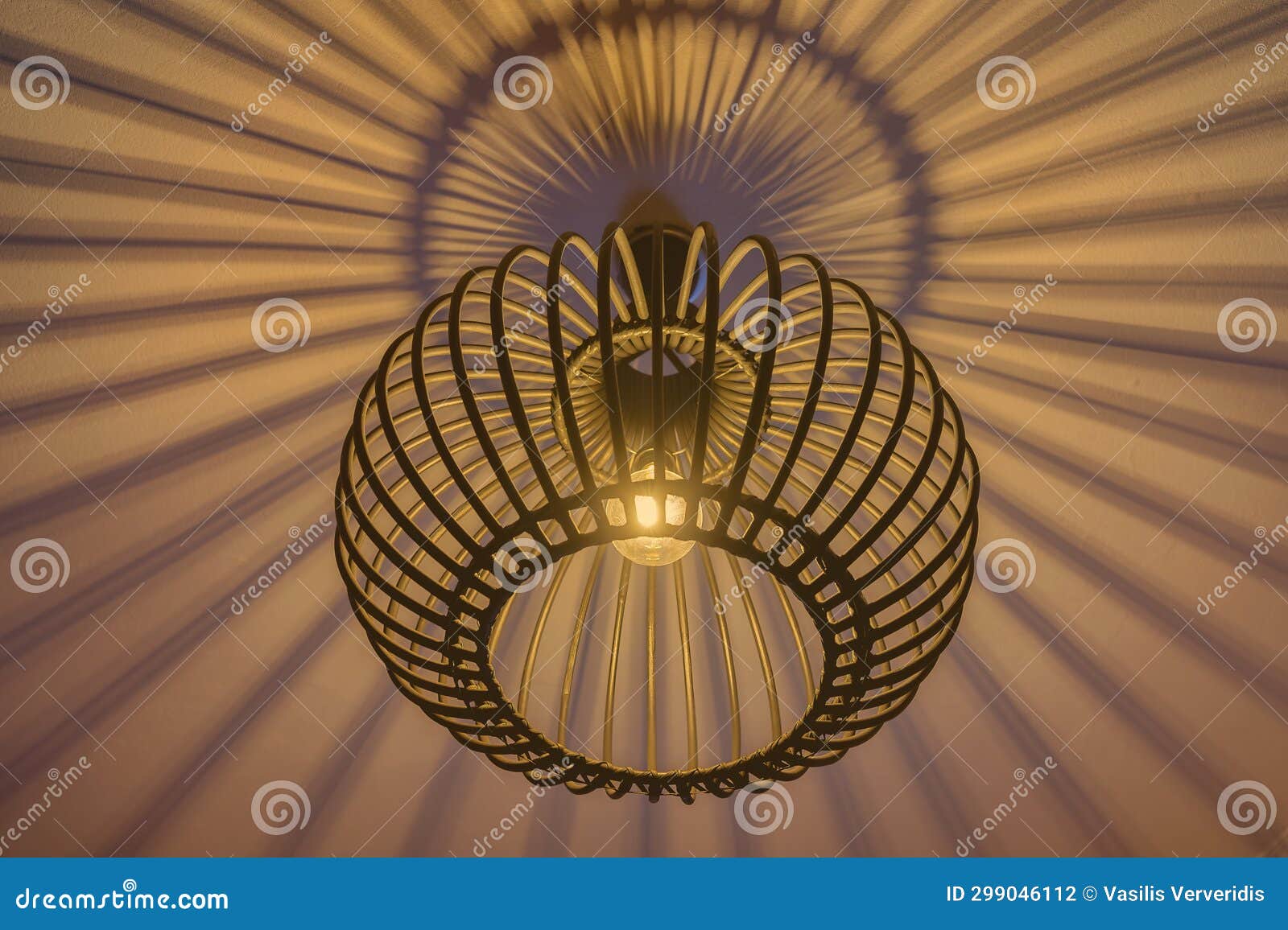Ceiling Light with Light Rays Creating an Effect on the Wall Stock ...