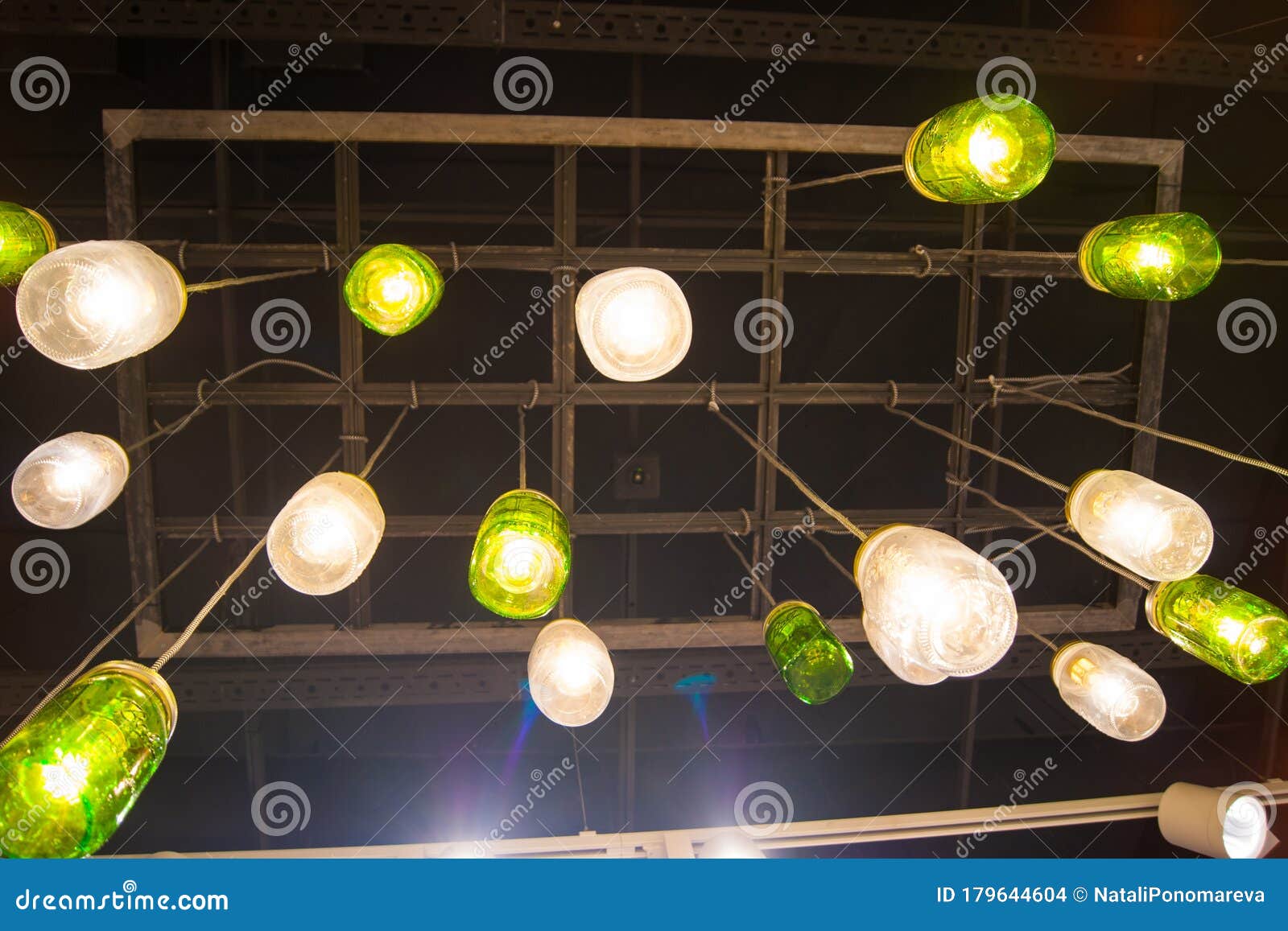 Ceiling Lights Under a Dark Ceiling Made of Canned Glass Painted in ...