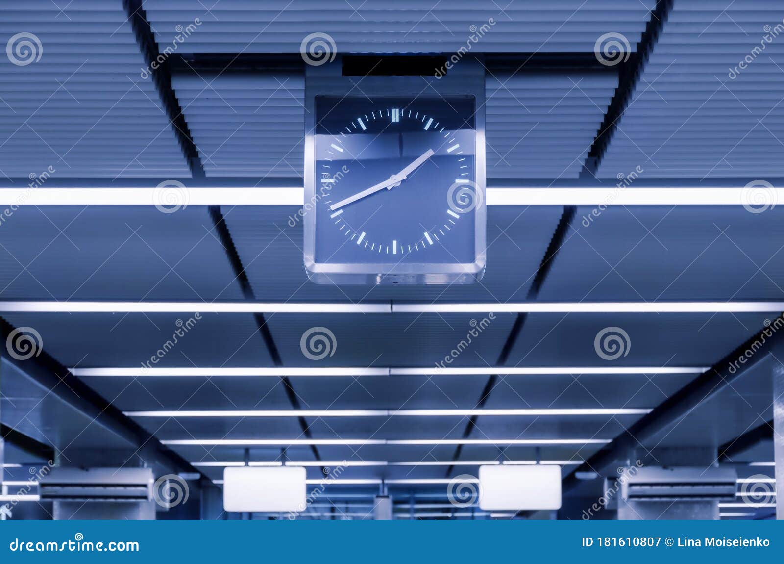 Ceiling in a Long Corridor with Clock Lit by Lights Stock Image - Image ...