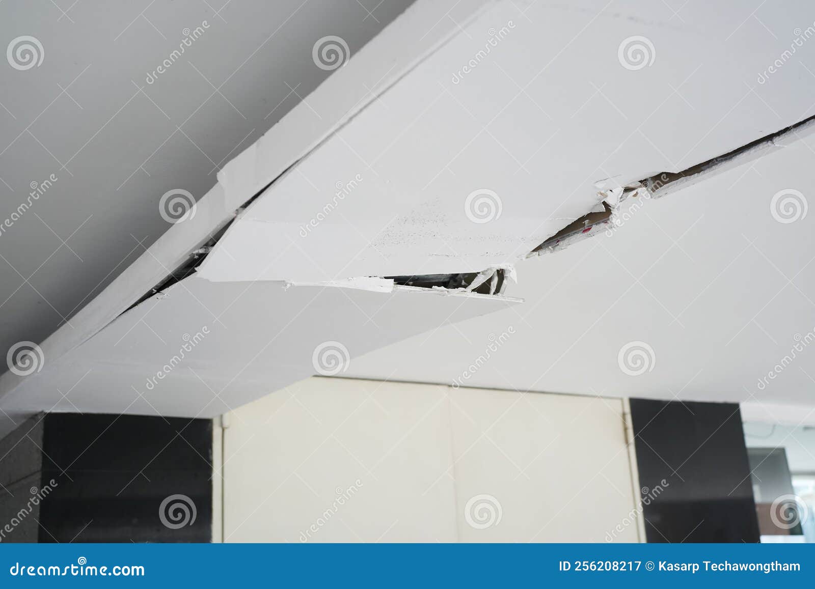 Ceiling Panels Damaged Huge Hole In Roof From Rainwater Leakage. Water ...