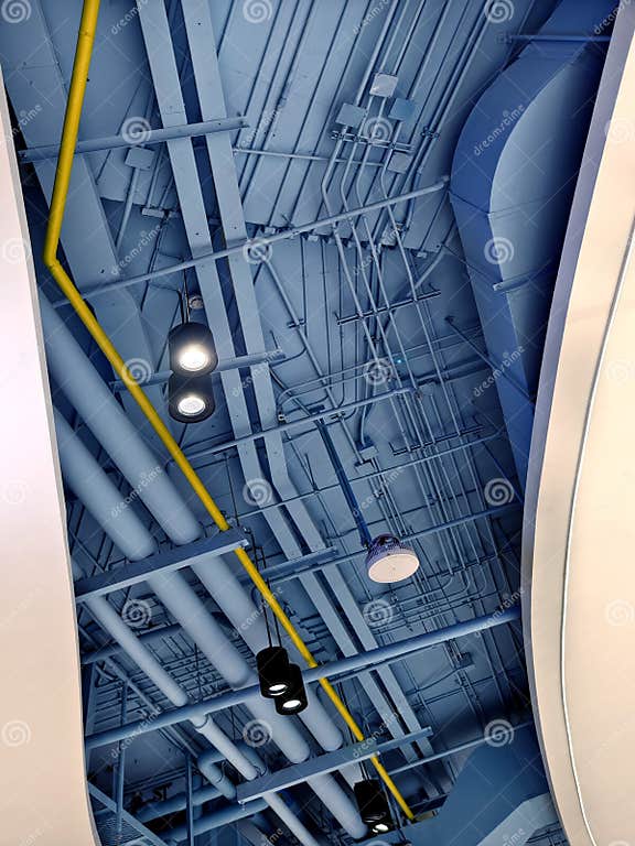 Ceiling with Pipes and Lights in Creates Industrial a Pattern Stock ...