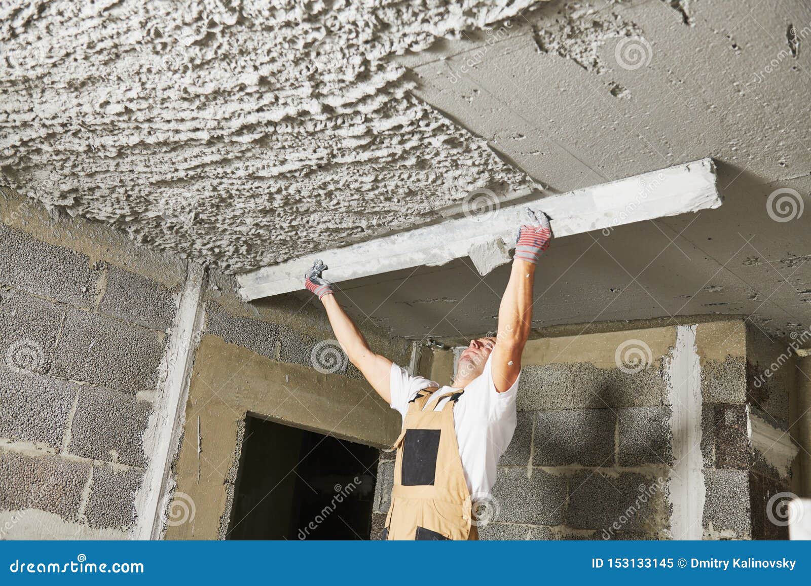 Plasterer Smoothing Plaster Mortar on Ceiling with Screeder Stock Image ...