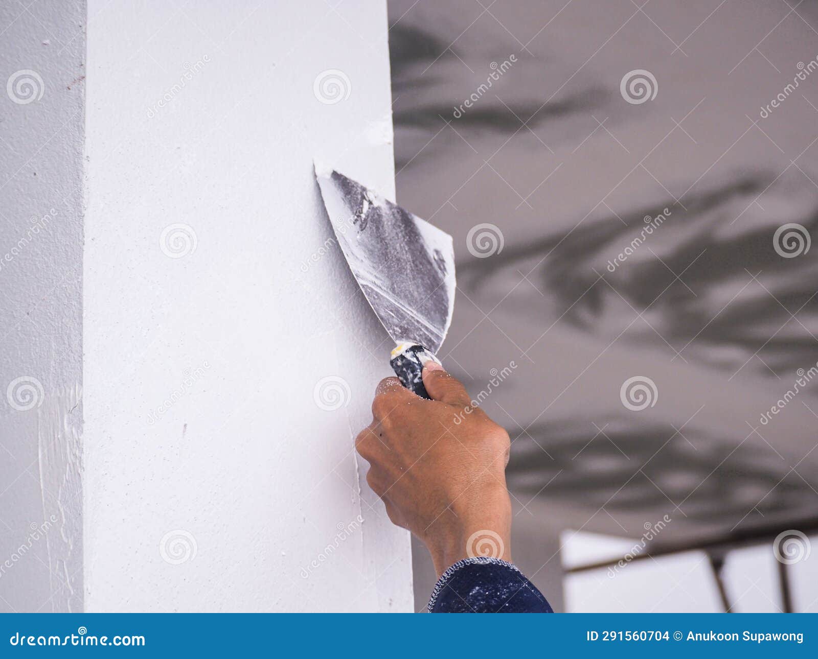 The Ceiling Worker is Plastering the Column with High Quality White ...