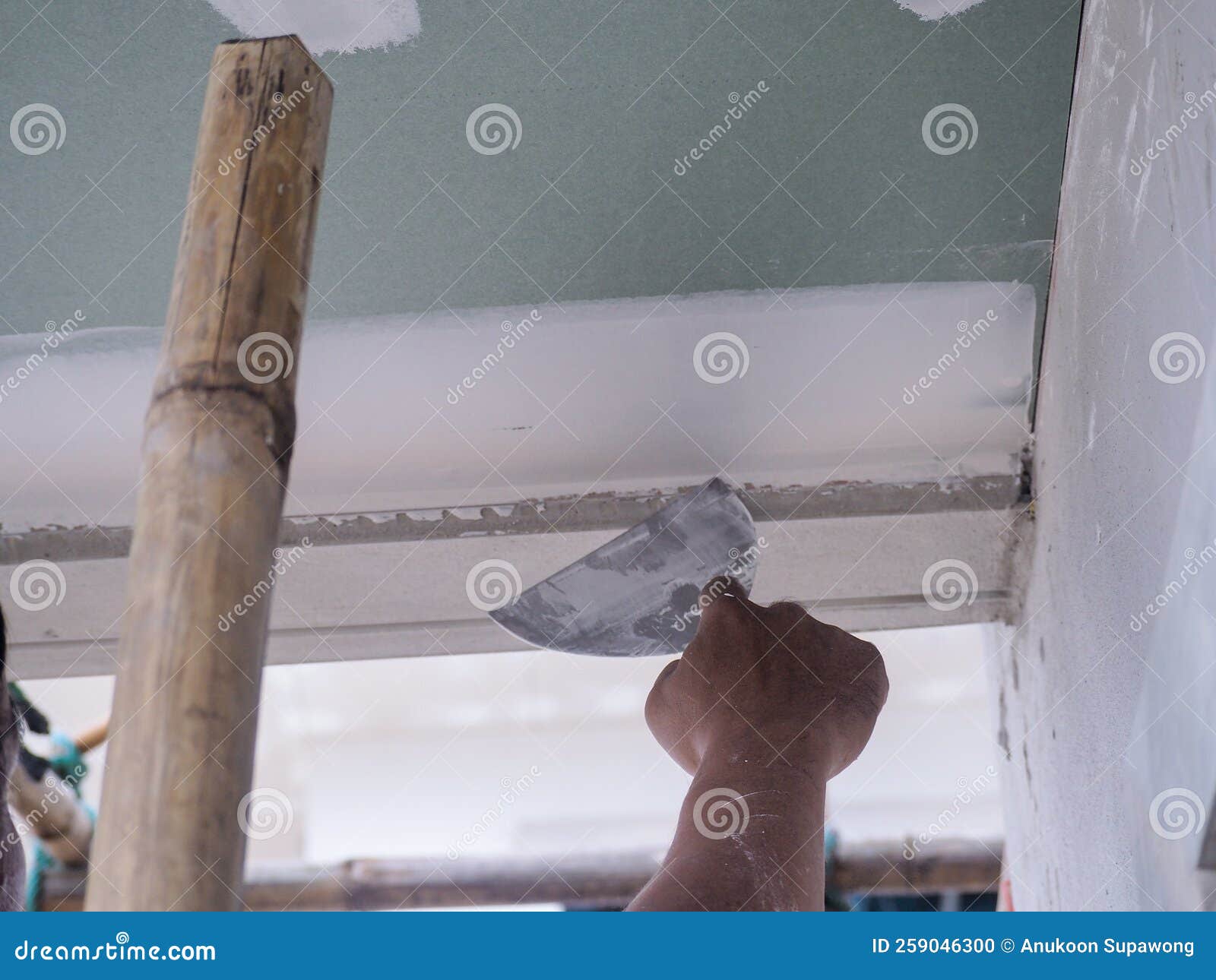 The Ceiling Worker is Plastering the Ceiling Joints with High Quality ...